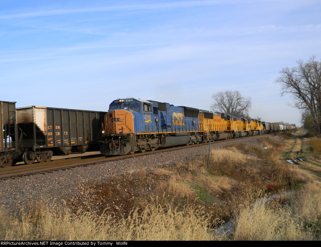 CSX 4713 Leads UP Train MASNL with a UP GP38-2 and a UPY MP15DC